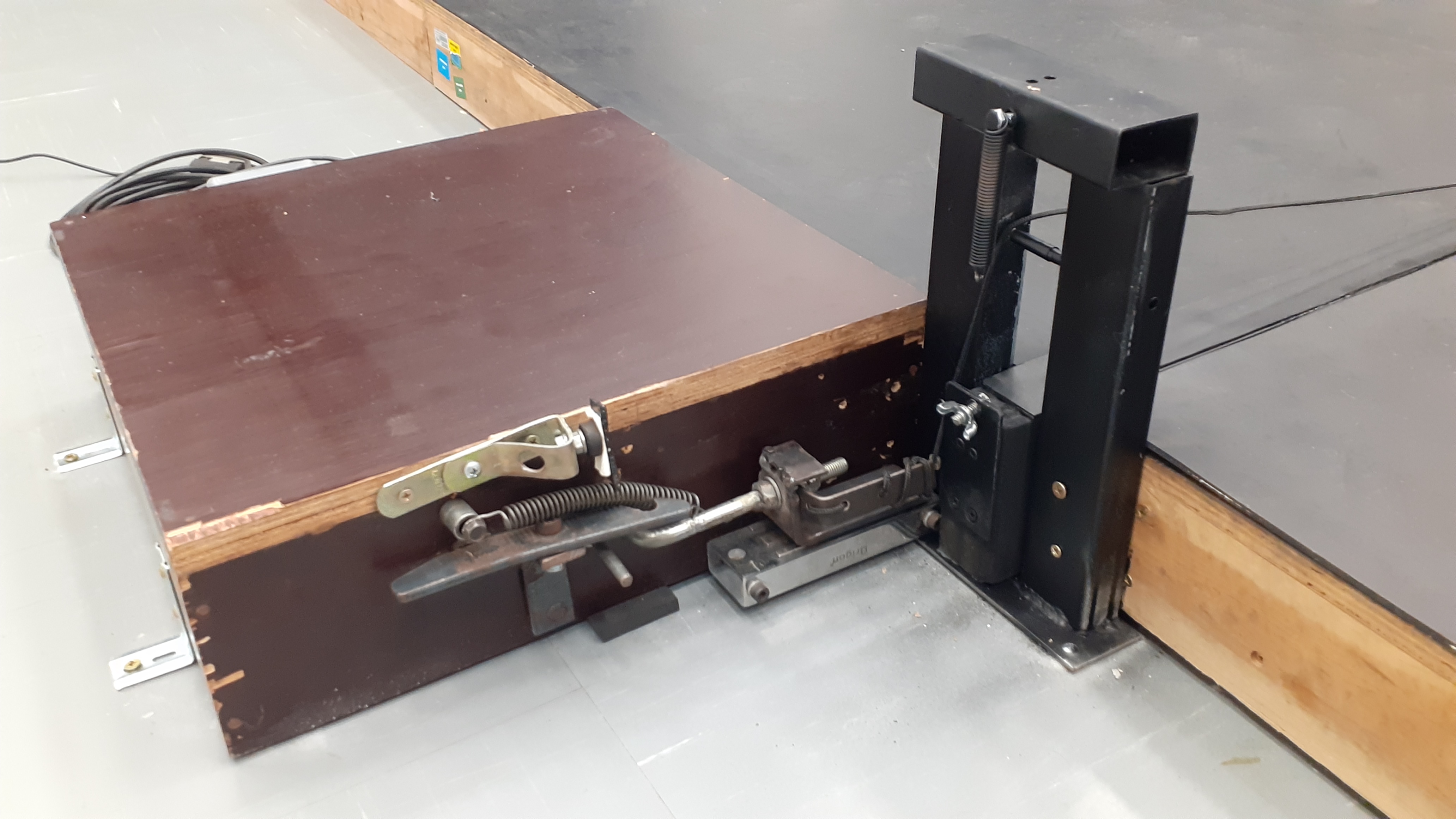 An Experimental Approach to Induce Trips in Lower-Limb Amputees